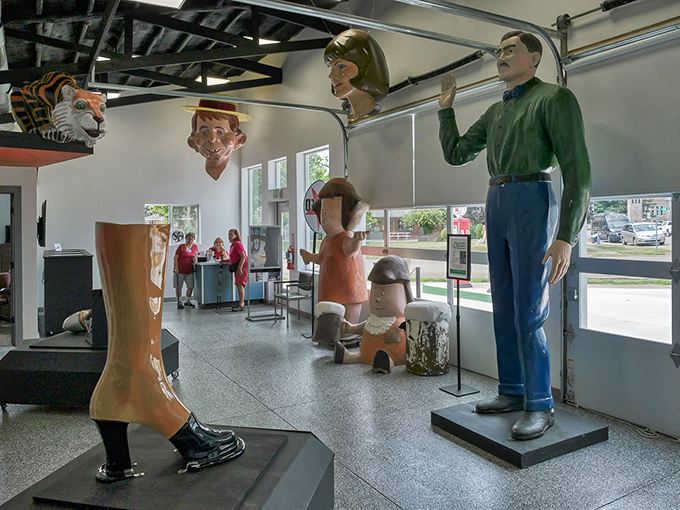 Inside the museum, visitors come face-to-knee with these gentle giants, getting a rare close-up look at America's disappearing roadside royalty.