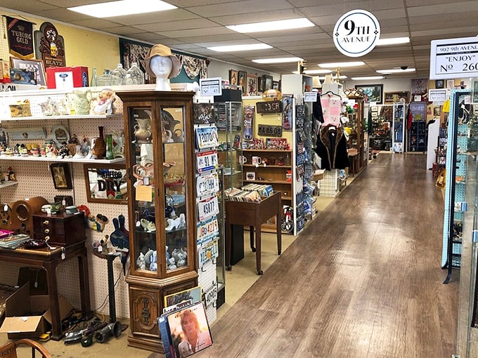 Endless aisles of organized chaos invite exploration. That mannequin head sporting a vintage hat has seen everything and is keeping secrets.