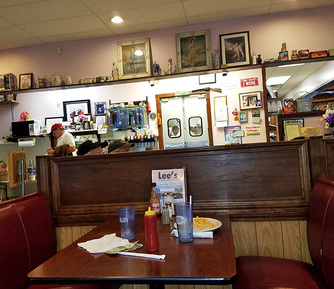 Every inch of wall space tells a story at Mr. Lee's. The memorabilia collection rivals the Smithsonian, but with better food service.