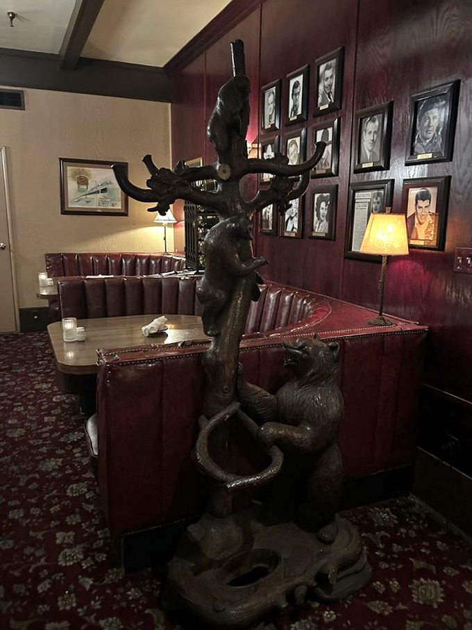 Art meets history on these walls, while a whimsical bear sculpture stands guard over diners' conversations and confessions. 