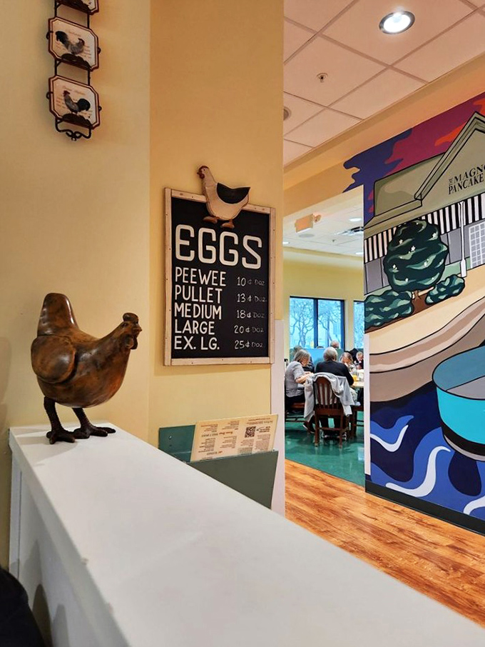 Whimsical chicken decor and egg sizing chart—because a restaurant that takes breakfast this seriously doesn't mess around with details.