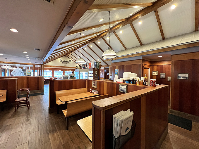 Wooden booths worn smooth by decades of happy diners. The vaulted ceiling gives your breakfast experience the reverence it deserves.