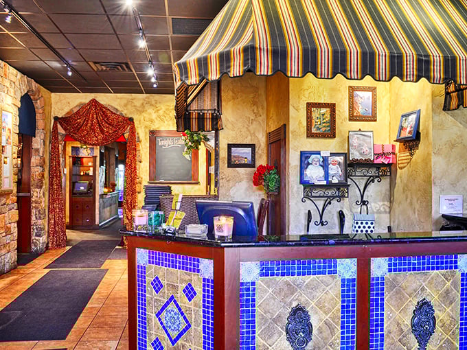 The host station welcomes you with Mediterranean charm. Those blue mosaic tiles and warm lighting are setting the stage for the feast to come.
