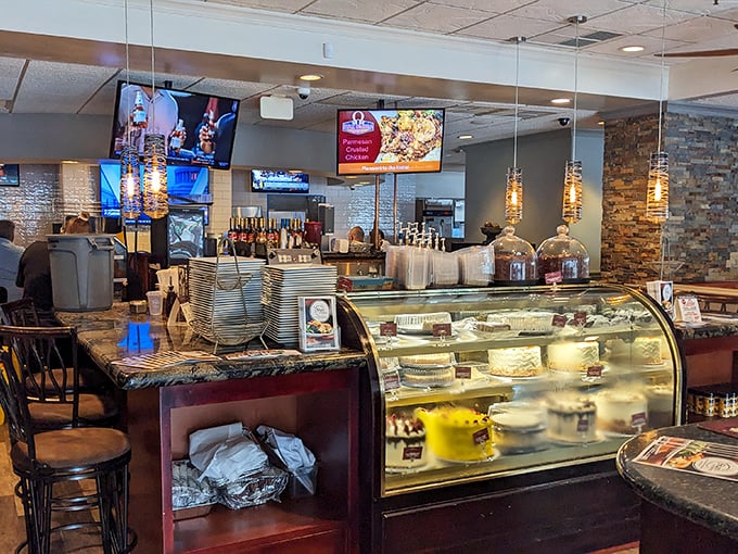 The dessert case temptation station—where willpower goes to die and "I'll just have a bite" becomes a delicious impossibility.