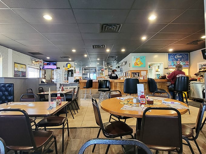 Another angle reveals the spacious dining room where locals gather for conversations, laughter, and consistently excellent comfort food daily.
