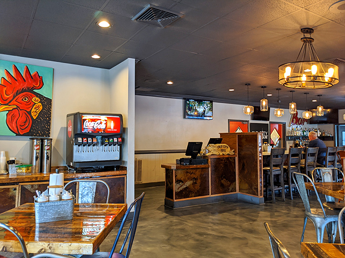Colorful artwork and rustic-industrial fixtures create an atmosphere that's both hip and homey&mdash;like your coolest friend's dining room.
