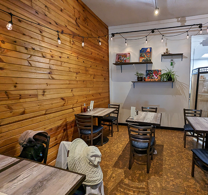 The minimalist interior with warm wood paneling creates a space where the food becomes the main character in your lunchtime story.