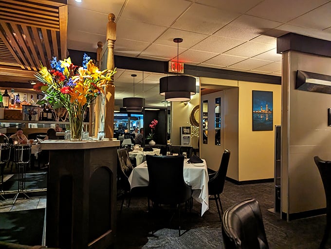 Fresh flowers and thoughtful design touches create dining spaces that feel both special and comfortably familiar.