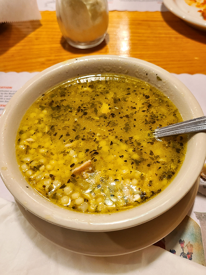 Italian wedding soup that's so authentic, you half expect to hear "That's Amore" playing with each spoonful.