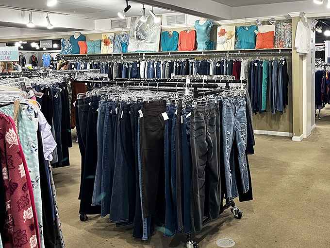 Denim for days! The jeans section is meticulously organized, proving that one person's castoffs become another's perfect-fitting fashion statement.