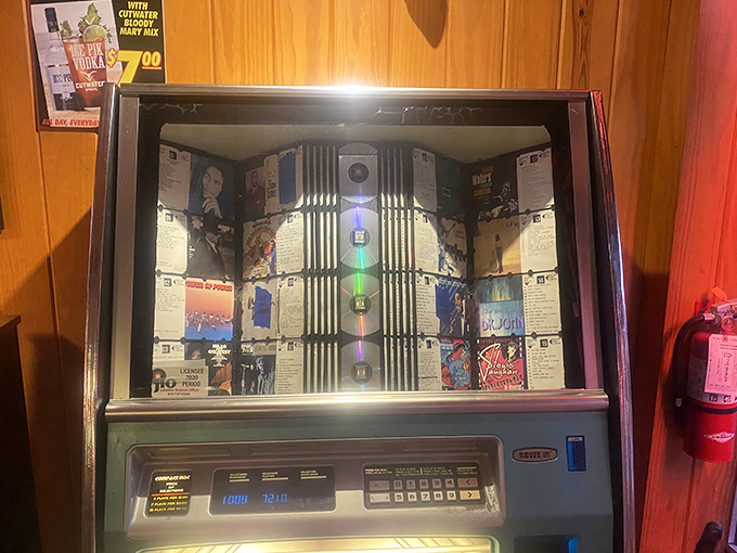 A vintage jukebox stands ready to soundtrack your meal with tunes from when music came on actual records.