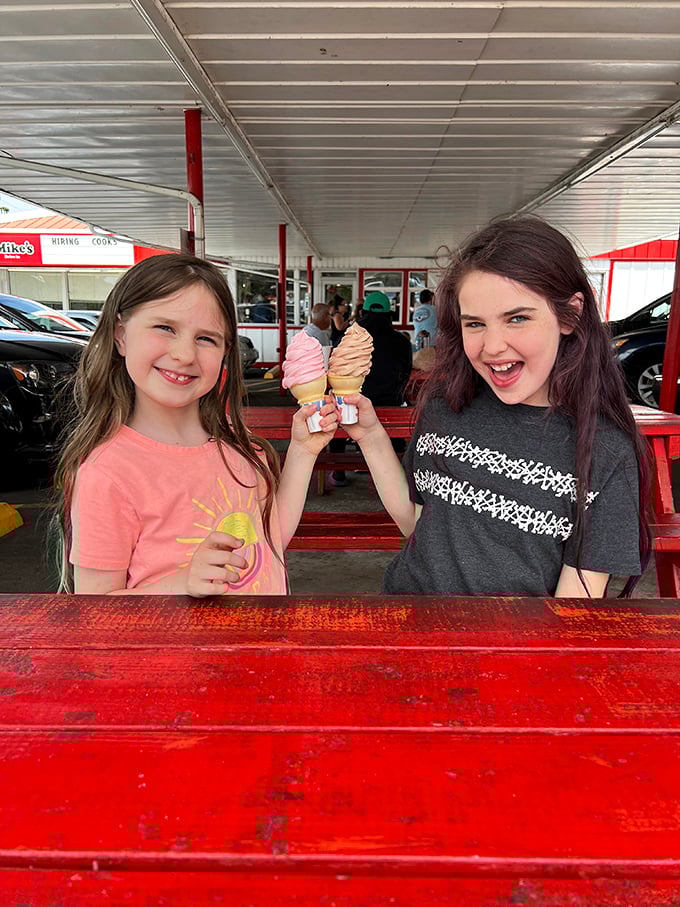 Ice cream cones held high in triumph&mdash;the universal symbol of childhood joy that never loses its magic, even as we grow.