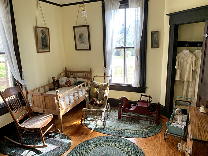 This children's bedroom, complete with handcrafted toys and cradles, reminds us that kids somehow survived childhood without iPads or Baby Shark on repeat.