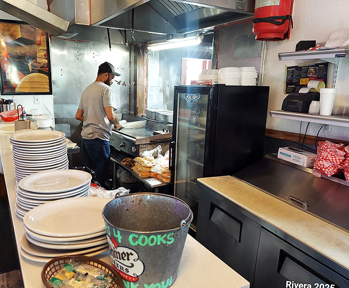 Where the magic happens&mdash;a no-nonsense kitchen turning out extraordinary food without fancy gadgets or pretension. Just skill, heart, and a bucket labeled "4 cooks."