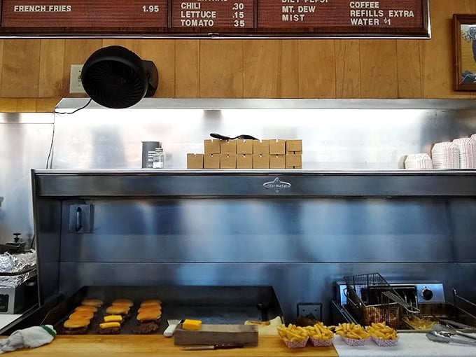 Behind-the-scenes magic where simple ingredients transform into extraordinary memories through skilled, practiced hands working efficiently.