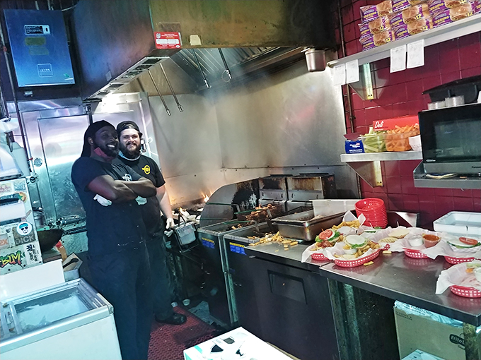 Where the magic happens. The kitchen crew stands ready to deliver wing perfection, working their culinary alchemy behind the scenes.