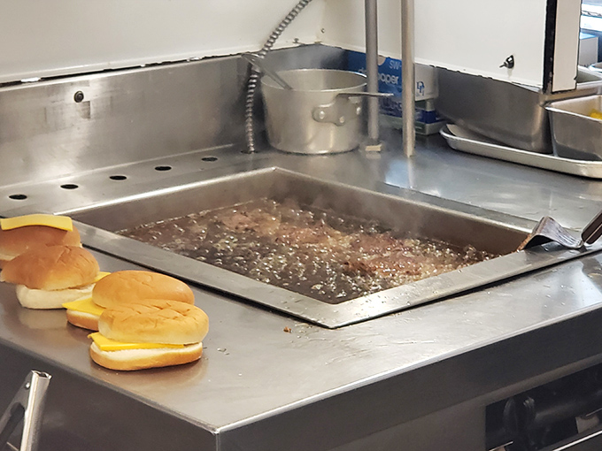 The bubbling cauldron of french fry perfection. Those buns wait patiently for their moment of glory, like actors in the wings before showtime.