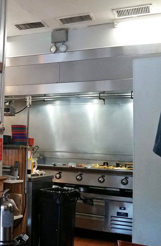 A glimpse into the kitchen's gleaming stainless steel heart, where breakfast alchemy transforms simple ingredients into gold.