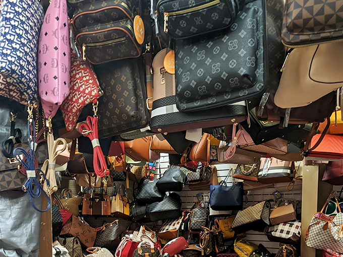 Designer-inspired handbags hanging like exotic fruit &ndash; pick one and instantly transform your outfit without transforming your bank account.