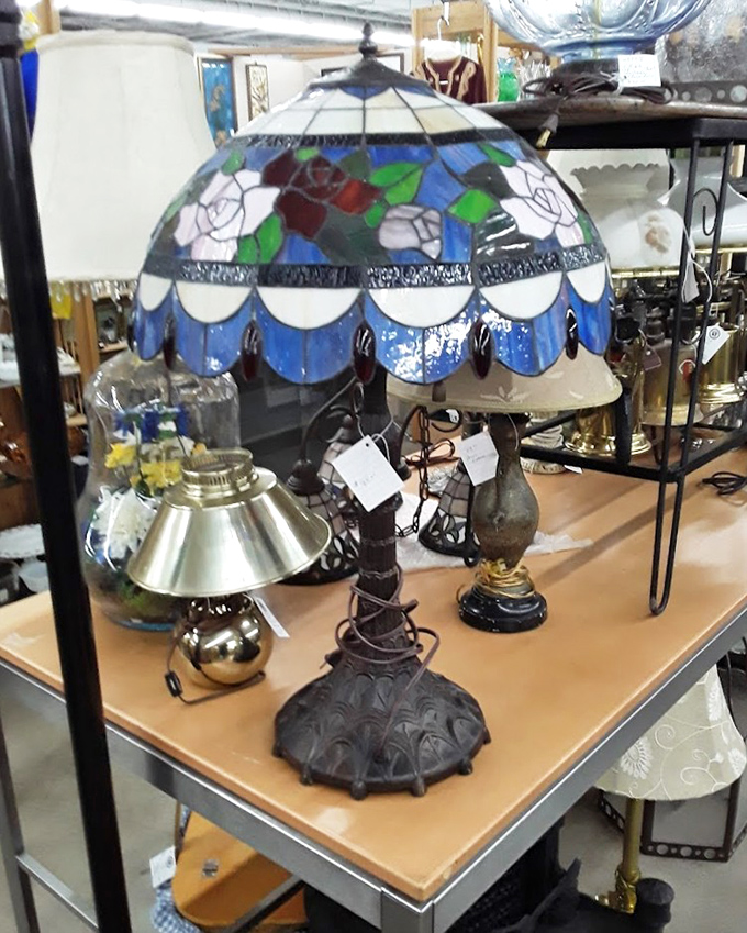 Tiffany-style lamps cast the same magical glow they did a century ago. This stained glass beauty would transform any room into an instant conversation piece.