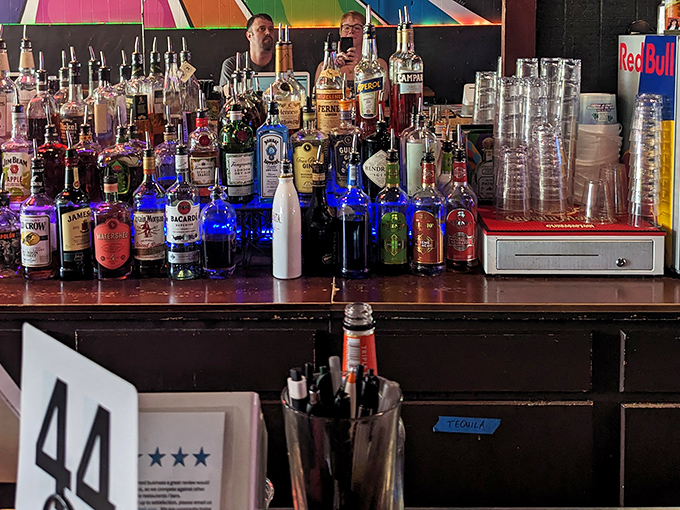 Behind the bar, a rainbow of bottles stands ready for action&mdash;like a liquid color wheel of possibilities for your evening's entertainment.