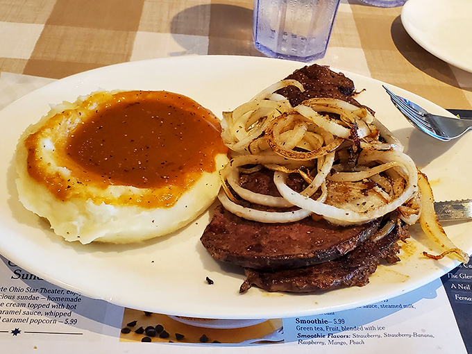 Liver and onions with mashed potatoes&mdash;a dish that separates the culinary adventurers from the tourists. That gravy pool deserves its own zip code.