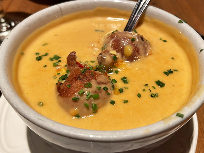 This lobster bisque isn't just soup&mdash;it's a warm hug in a bowl, with chunks of lobster playing hide and seek in a velvety sea.