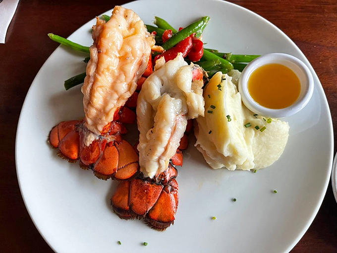 Lobster tails so perfectly cooked they make you question all your previous life choices that didn't involve eating this exact dish.