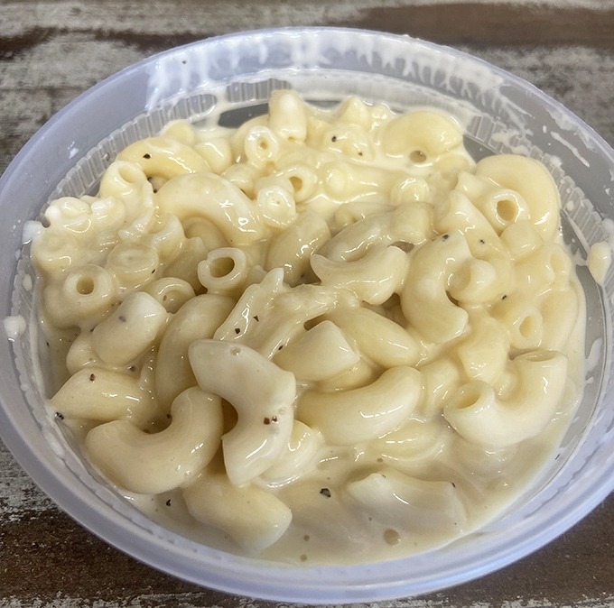 Mac and cheese that achieves the golden ratio of creaminess to cheesy pull – a supporting actor that sometimes steals the show.