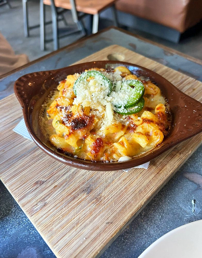 Mac and cheese that bubbles with intention&mdash;topped with a jalape&ntilde;o slice that serves as both warning and invitation.