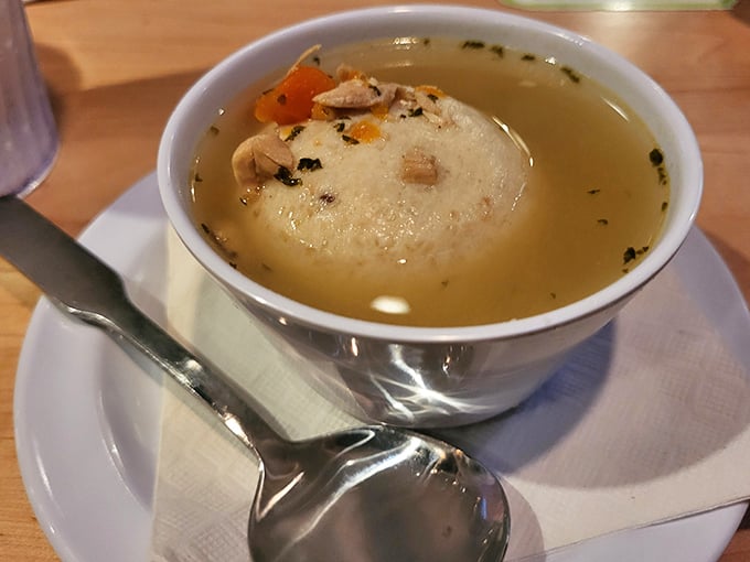 This isn't just soup &ndash; it's liquid comfort. The matzo ball floats like a cloud in a broth that grandmothers everywhere would approve of.