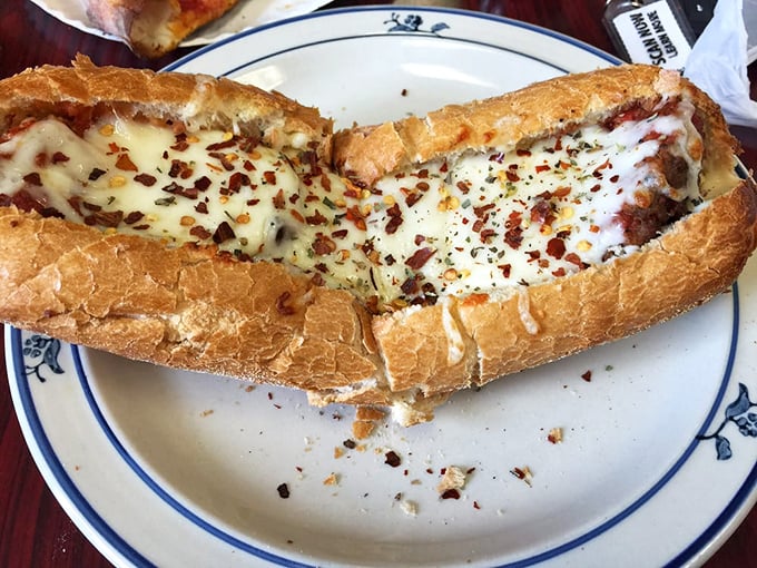 A meatball sub that demands respect and requires napkins. The crusty bread barely contains the saucy, cheesy magnificence within.