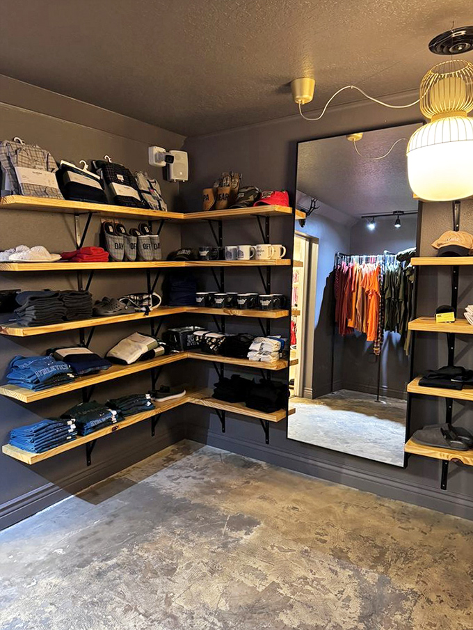 A men's boutique disguised as thrift shopping, where style meets savings in the most unexpected warehouse setting.