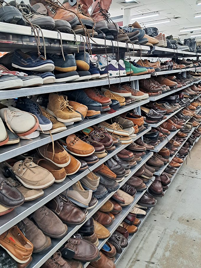 Men's shoes lined up like eager job applicants, each pair with stories worn into their soles and character in every scuff.