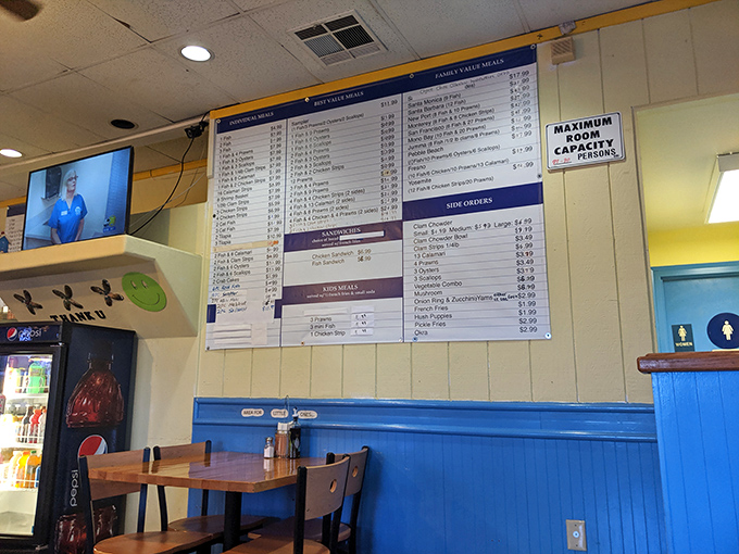 The wall menu board &ndash; a roadmap to happiness that locals have memorized but still study with the reverence of an ancient text.