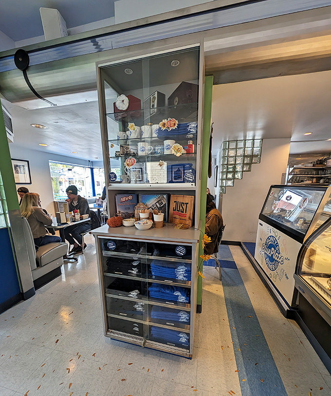 Merchandise display that says, "Yes, people love this place enough to wear its logo"—the ultimate restaurant compliment.