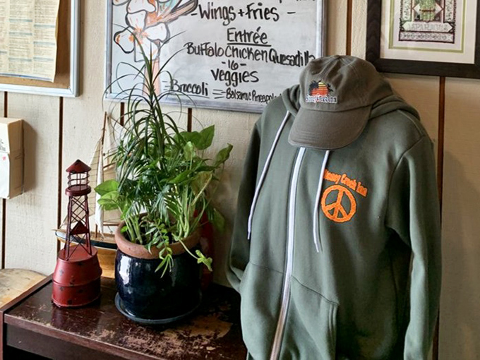 When you love a place so much you want to wear it home. The peace sign suggests their seafood might just bring world harmony.