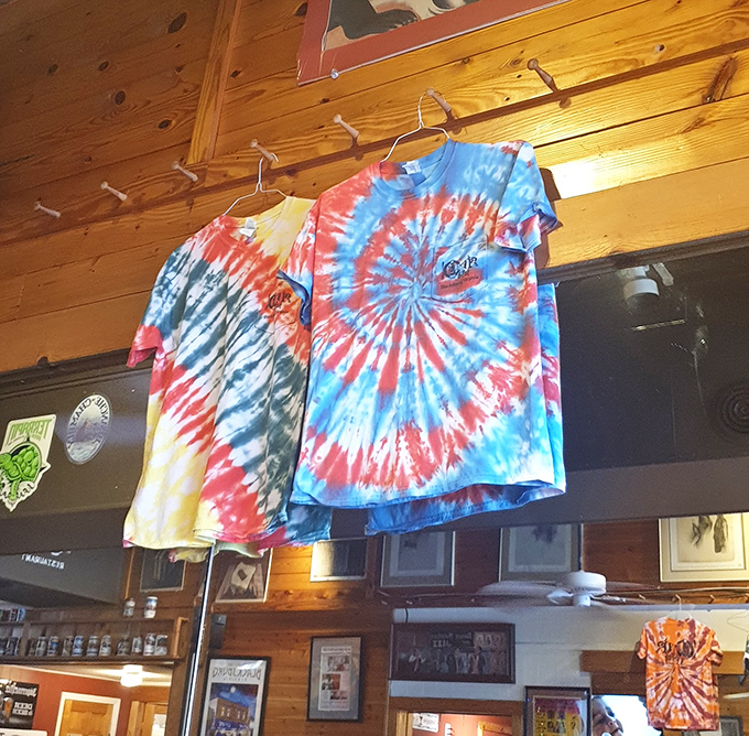 Tie-dye t-shirts hanging like psychedelic flags &ndash; because nothing says "established eatery" like merchandise that screams "eternal college spirit."