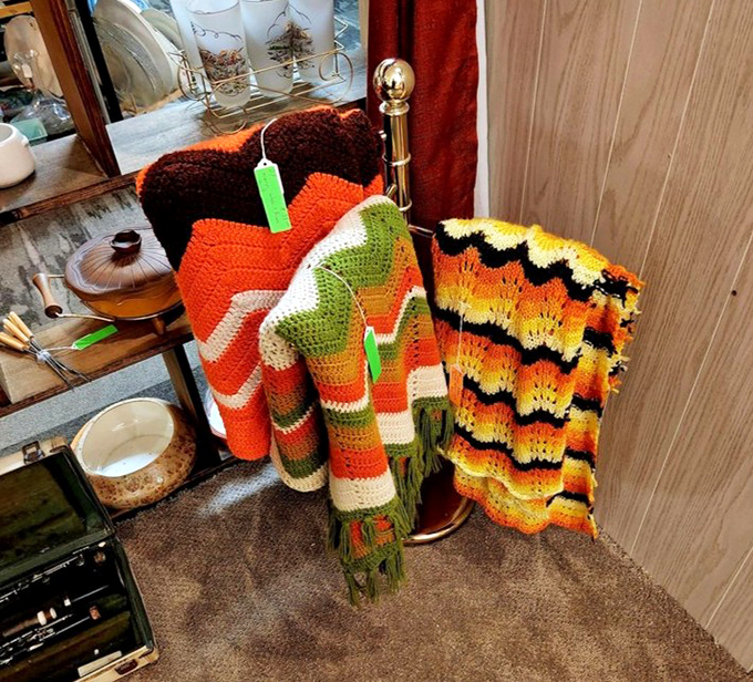 Handmade afghans in sunset hues that somehow match the Florida sky, each one carrying the warmth of a grandmother's living room.