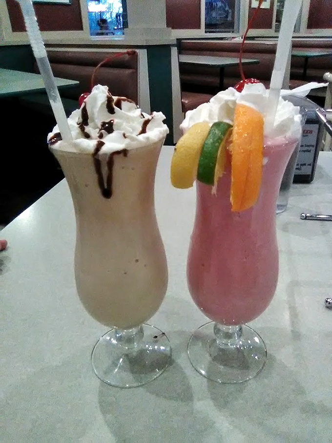 Milkshakes that understand sometimes adults need dessert in a glass too&mdash;one chocolate, one strawberry, both magnificent.