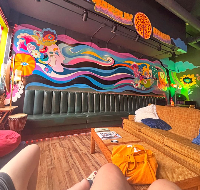 That mural isn't just decoration&mdash;it's a statement of intent. Pizza as art, dining as experience, walls as canvas. The 60s never left; they just got tastier.