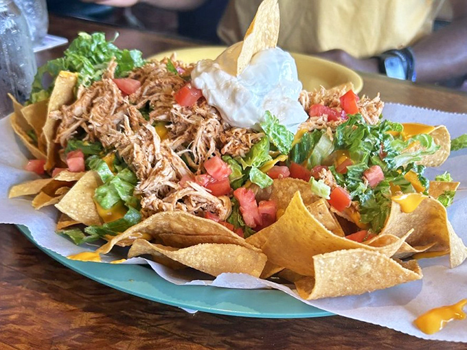 These aren't just nachos&mdash;they're a fiesta on a plate where pulled meat, fresh veggies, and melted cheese throw the ultimate flavor party.