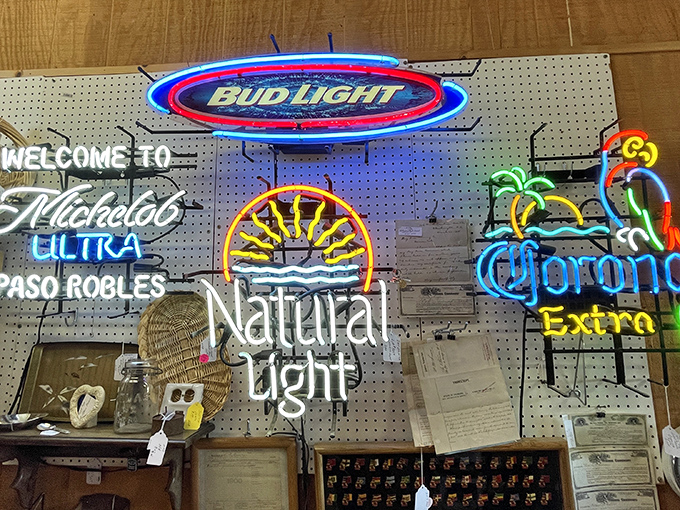 The neon beer signs buzz with electric nostalgia, illuminating memories of first dates and favorite watering holes long since closed.