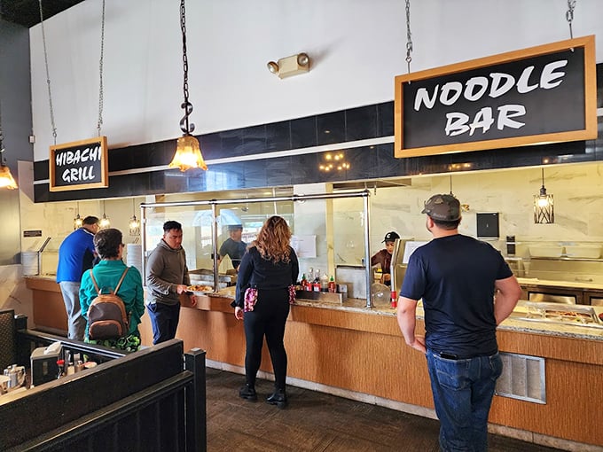 The noodle bar station, where customization is king and watching your dish being prepared is half the entertainment.