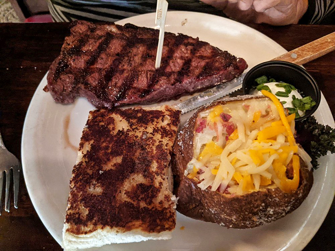 This New York strip with loaded baked potato isn't just dinner&mdash;it's what people in Manhattan wish they were eating right now.