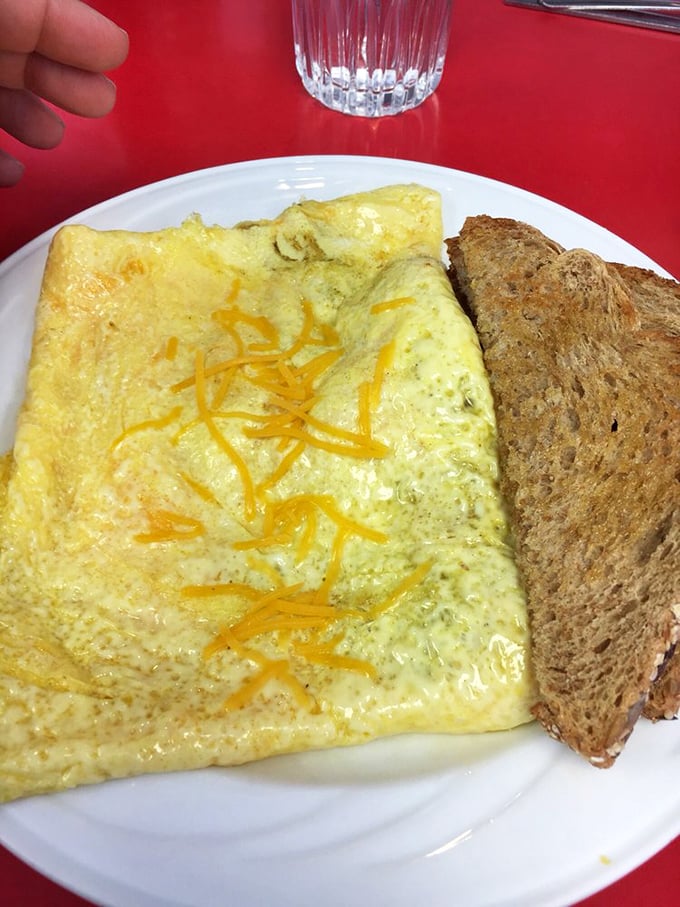 This isn't just an omelet&mdash;it's a fluffy yellow envelope delivering a cheesy message directly to your taste buds, with toast standing by for dipping duty.