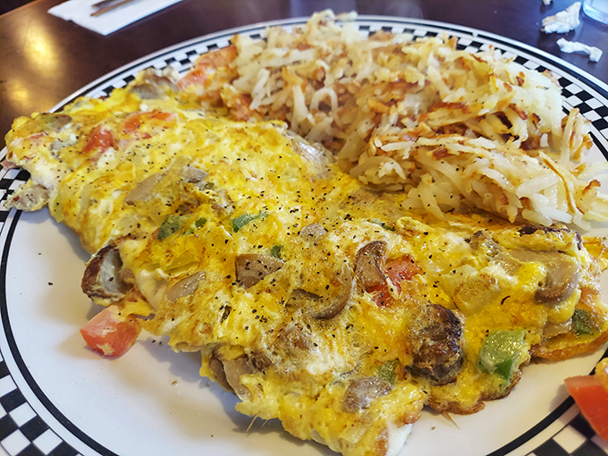 This omelet didn't just incorporate vegetables&mdash;it embraced them completely, then cozied up to hash browns that achieved the perfect crisp-to-tender ratio.
