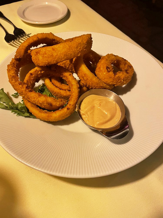 Onion rings that achieve the perfect balance of crispy exterior and sweet, tender onion hiding inside.