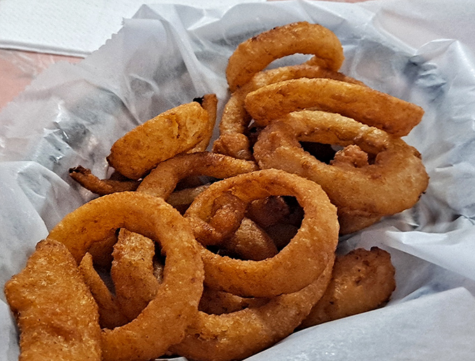 These onion rings deserve their own zip code&mdash;perfectly golden hoops of crispy batter surrounding sweet onion that surrenders at first bite.