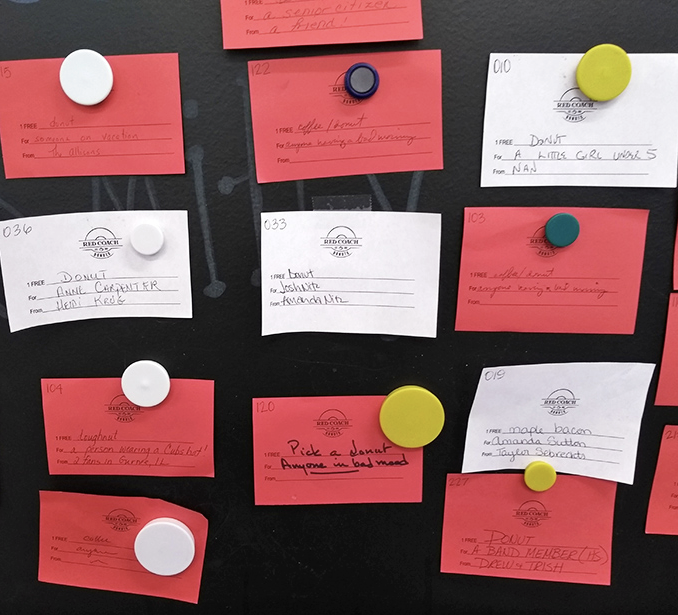 A wall of prepaid kindness&mdash;where strangers leave the gift of donuts for others. Proof that frosted goodness brings out the best in humanity.